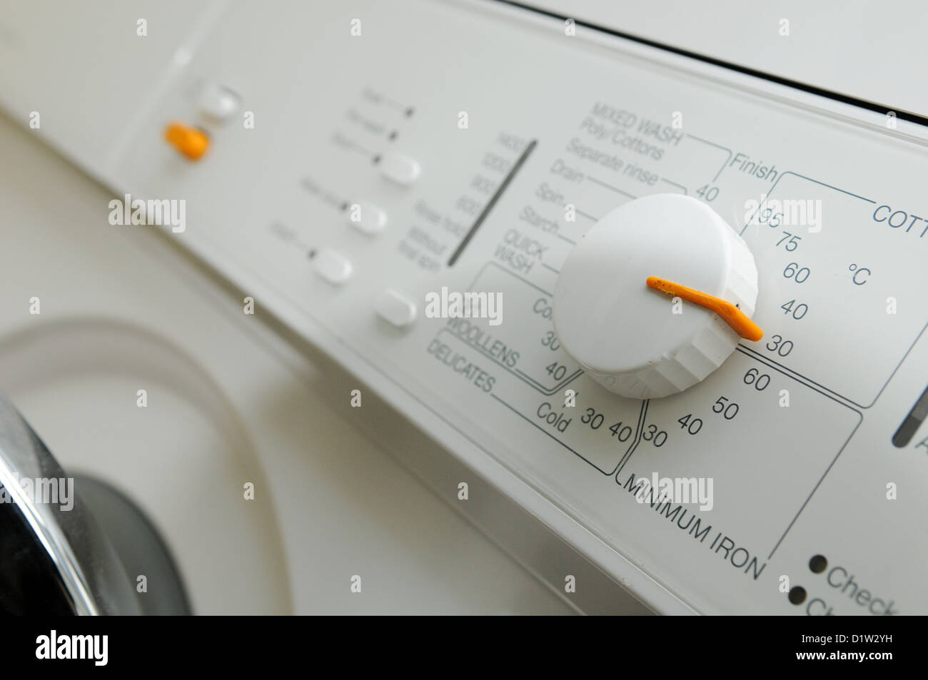 Dial set to an energy efficient 30 degrees and controls on a white ...