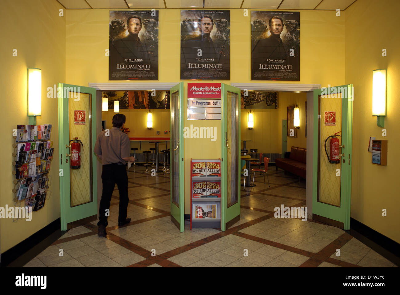 Man in cinema foyer hi-res stock photography and images - Alamy