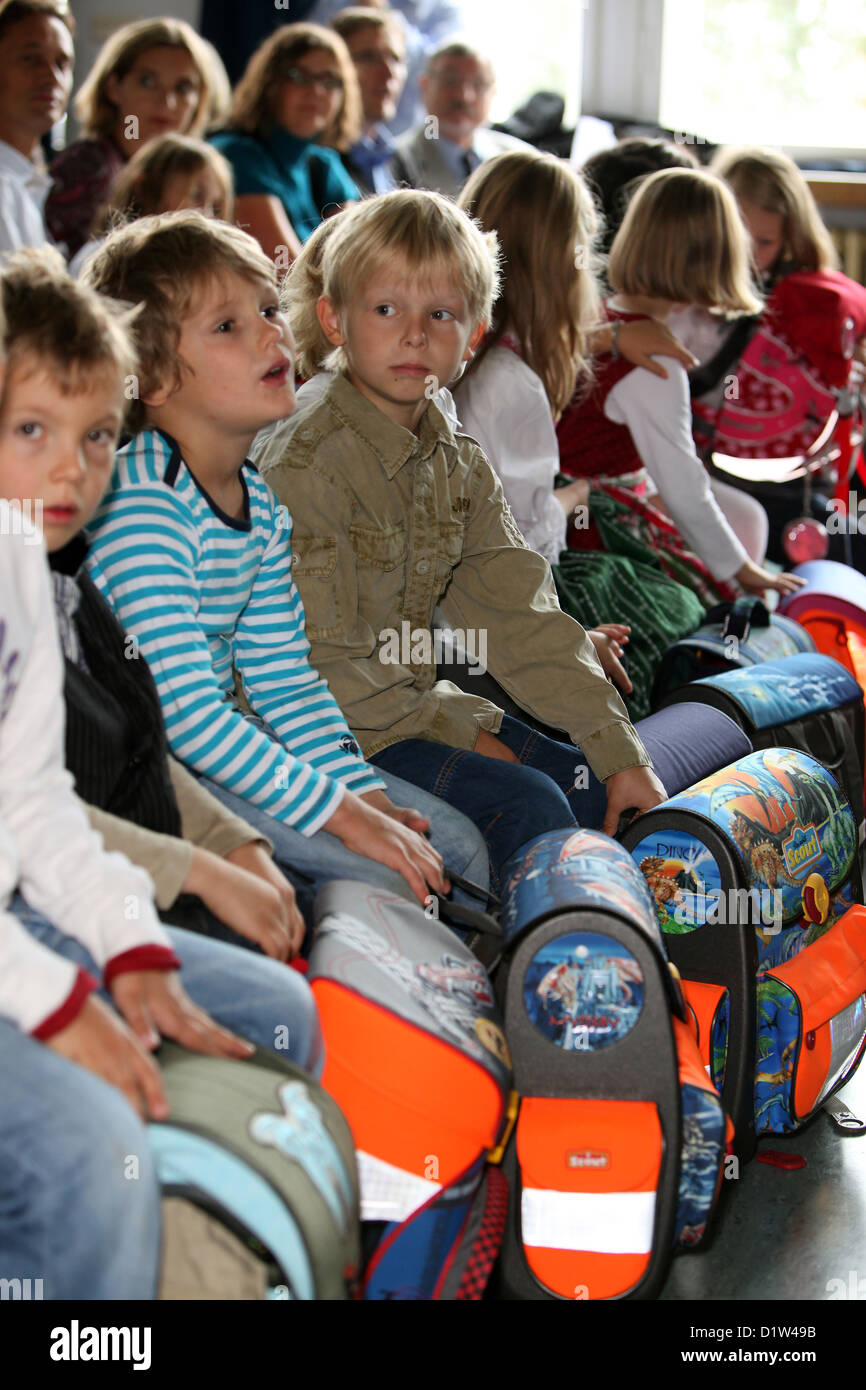 Berlin, Germany, first-graders sit on their first day in the auditorium ...