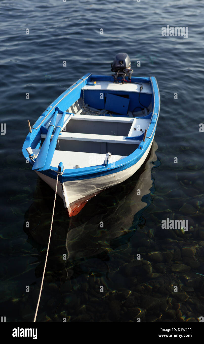 Alicudi, Italy, empty rowing boat in the water Stock Photo - Alamy