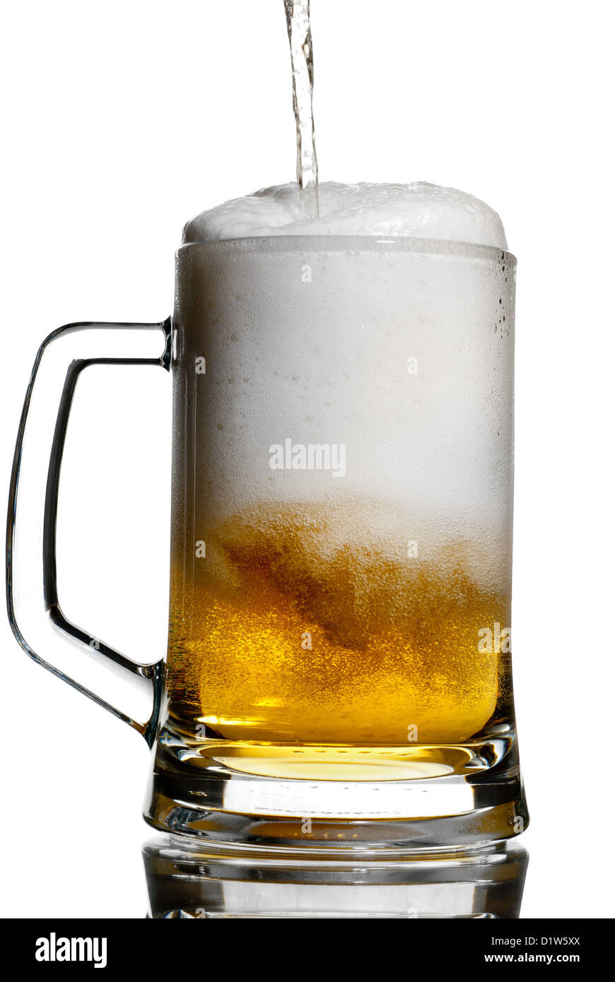 Pouring a light beer in a transparent keg isolated on white Stock Photo ...