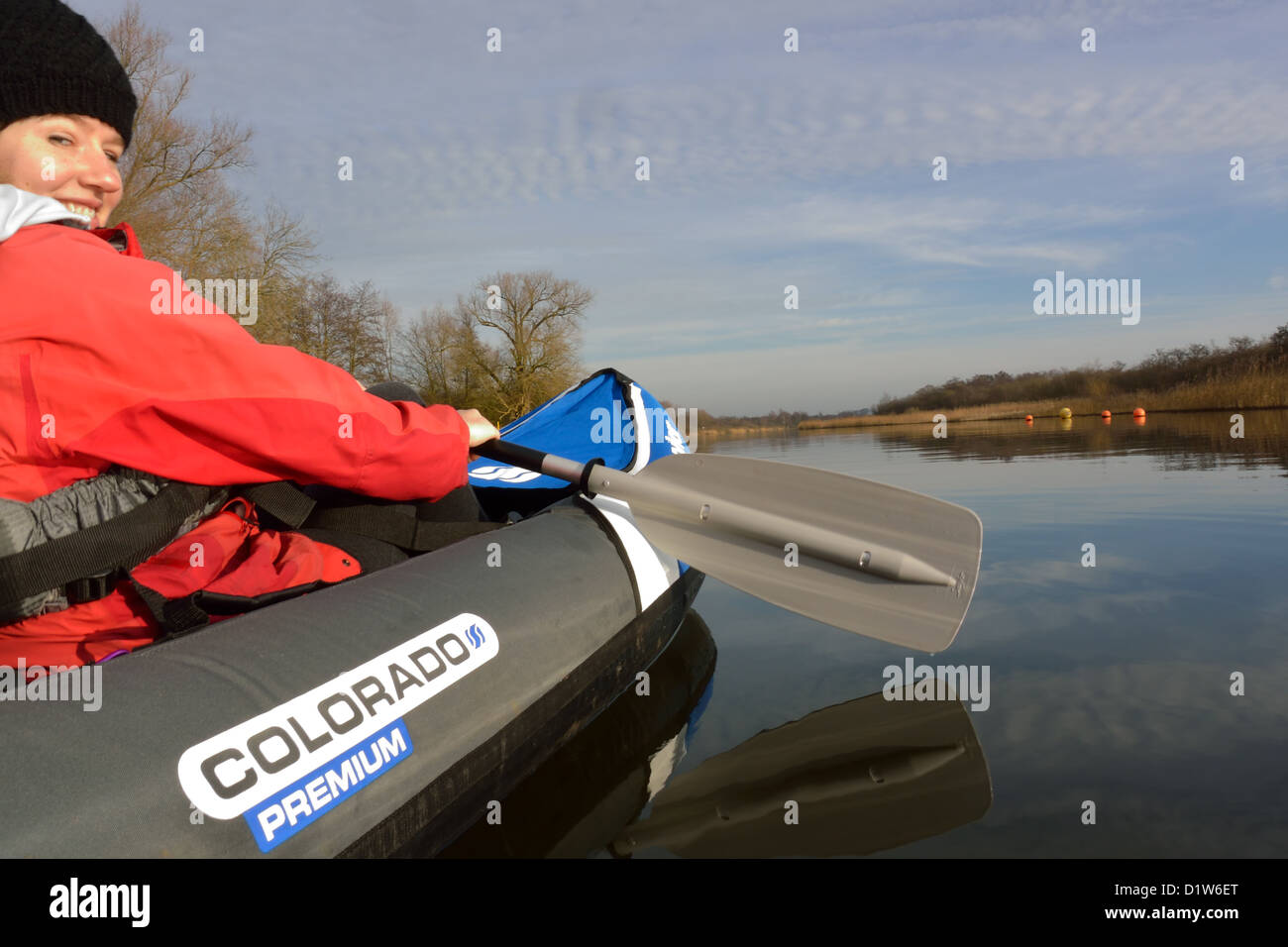 Young woman in Sevylor Colorado Premium inflatable canoe on the River ...