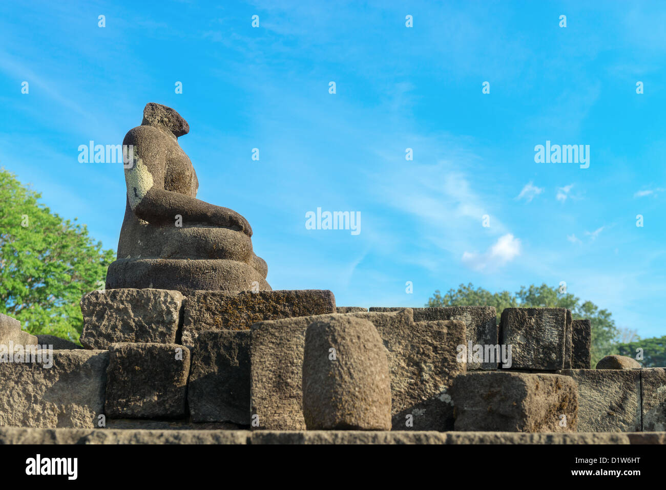 Buddha statue without head in Candi Sewu complex Stock Photo - Alamy