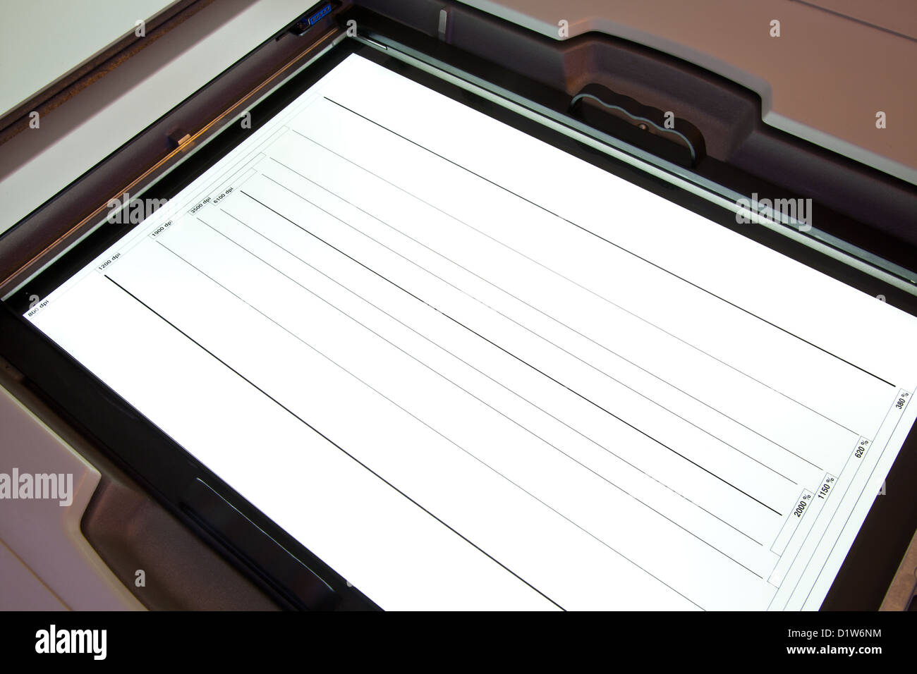 The lit bed of a flatbed scanner Stock Photo - Alamy