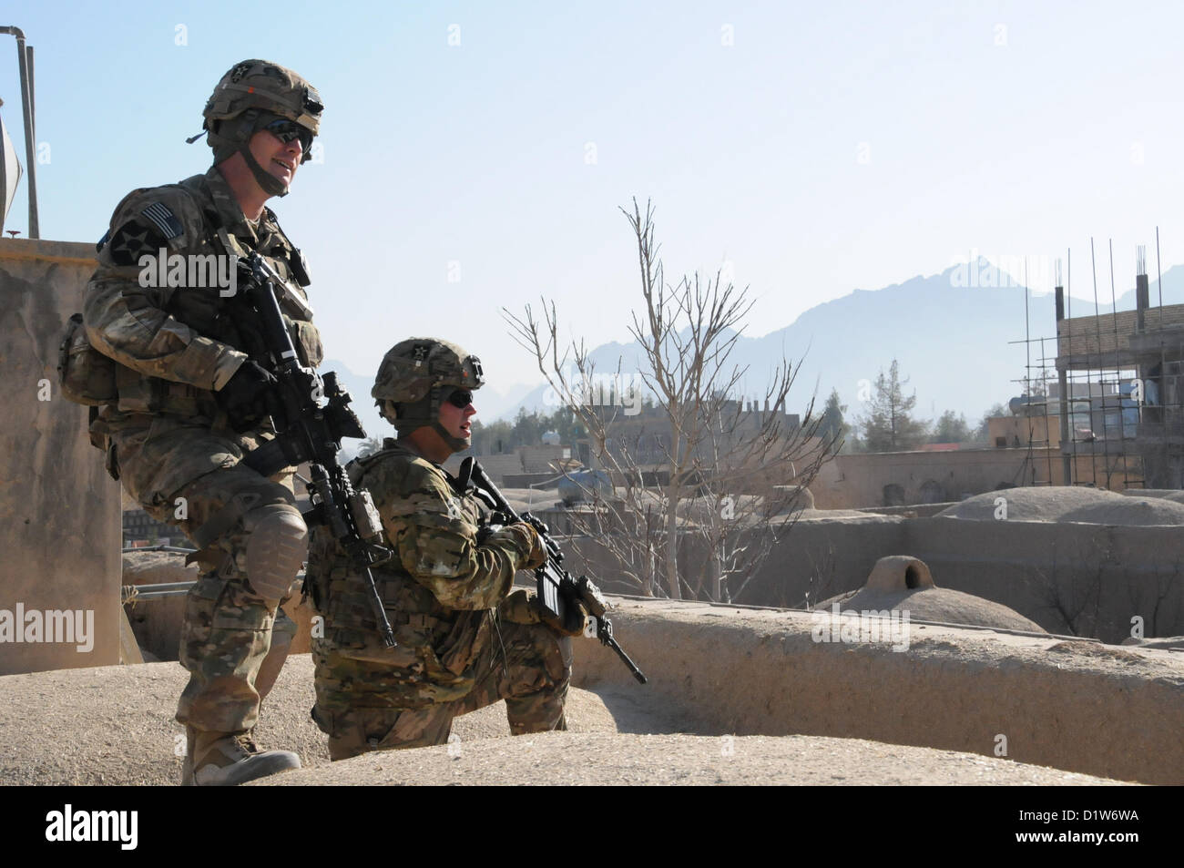 U.S. Army security force team provides rooftop security during a key ...