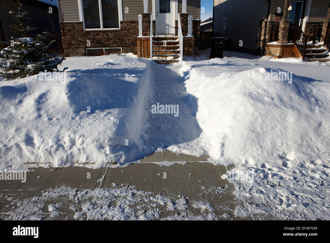house with path cleared of snow leading to front porch Saskatoon ...