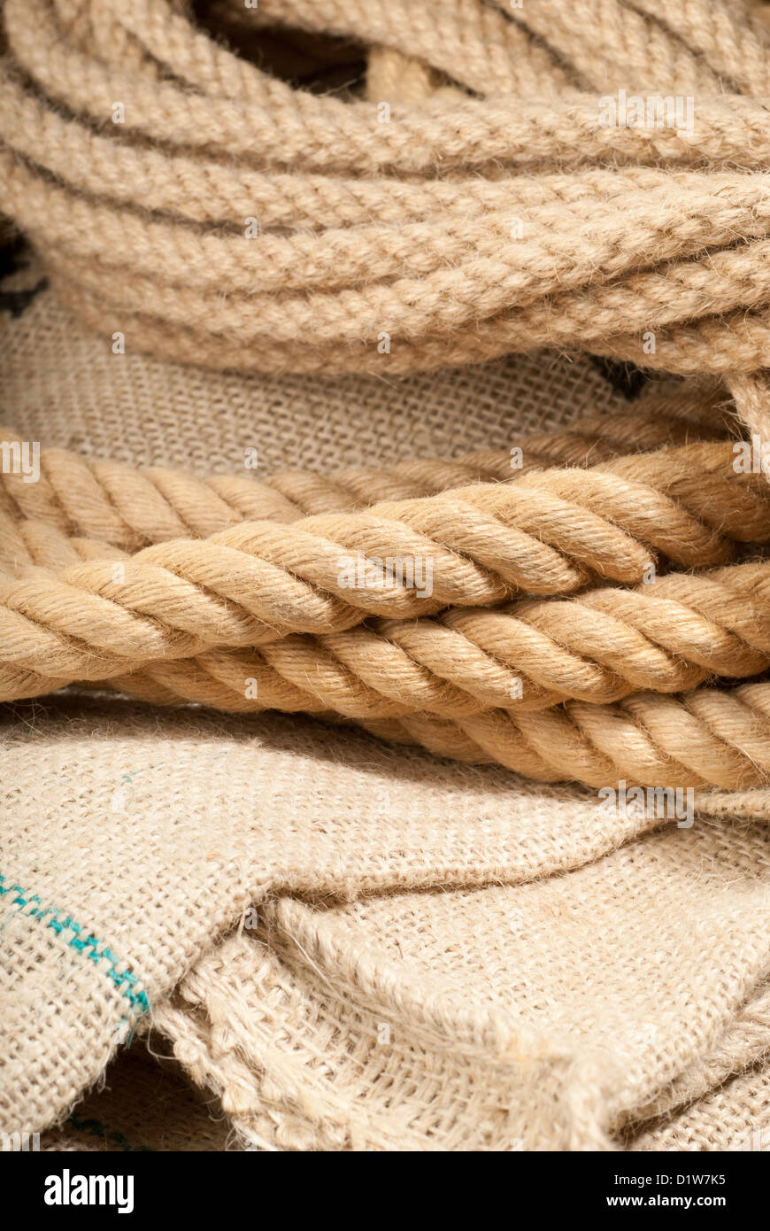 Thick and thin natural fiber rope Stock Photo - Alamy