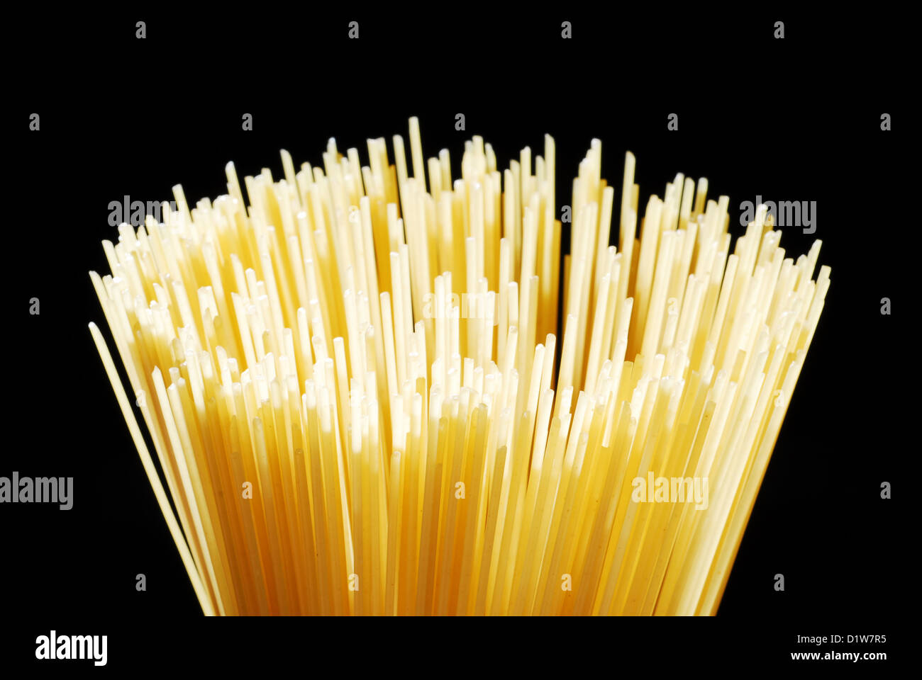 Italian spaghetti rods circular arrangement isolated on black Stock ...