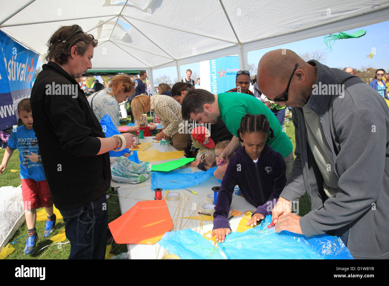 A kite making workshop at Streatham Common Kite Day, London Stock Photo ...