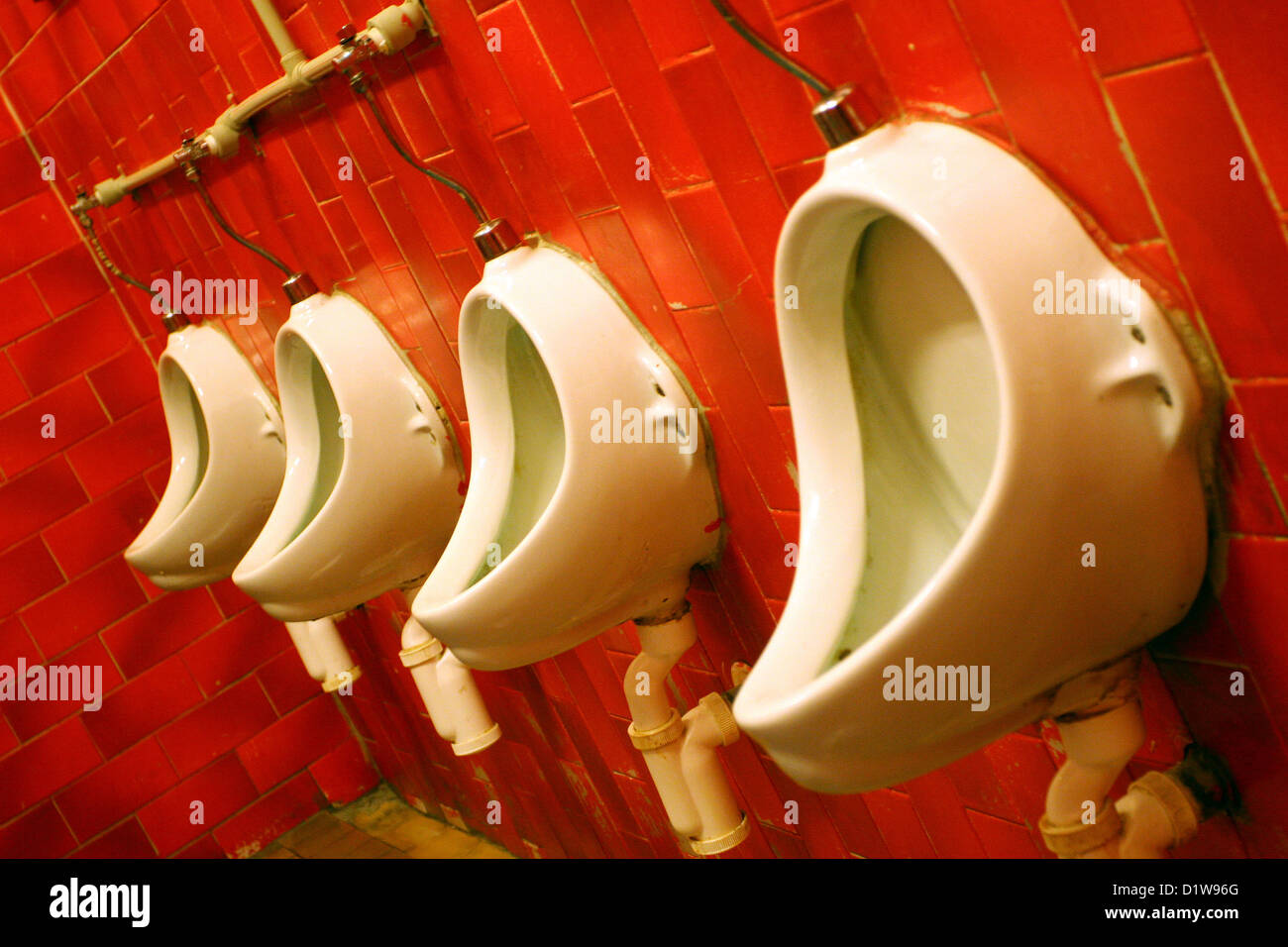 Male urinals in a public bathroom, Prague Czech Republic, Europe Stock ...