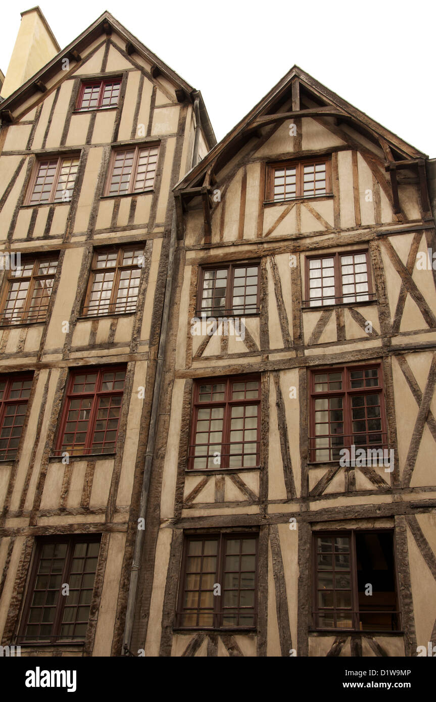 This pair of medieval half-timbered houses in the fashionable Marais ...