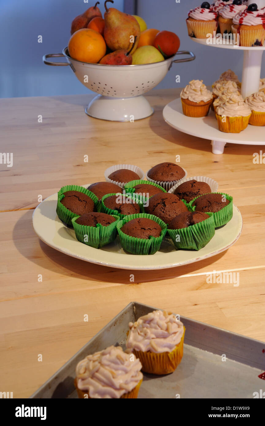 The preparation of tastefully beautiful cupcakes Stock Photo - Alamy
