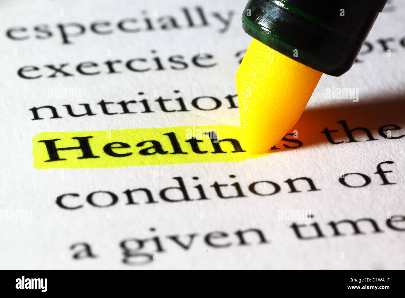 Word health highlighted with a yellow marker Stock Photo - Alamy
