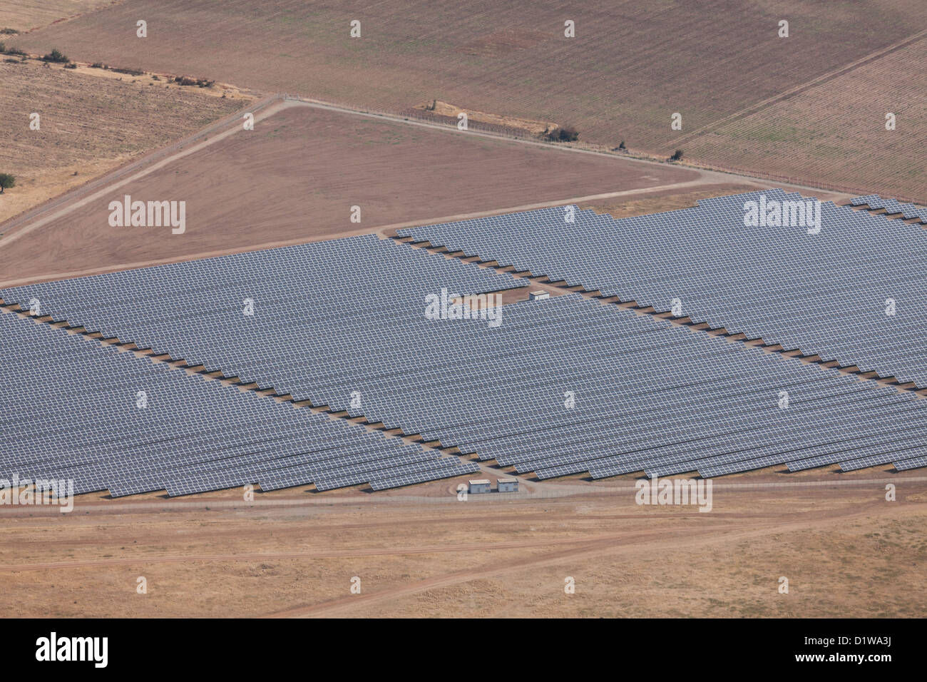 Aerial photo of solar power plant. Many solar energy panels in ...