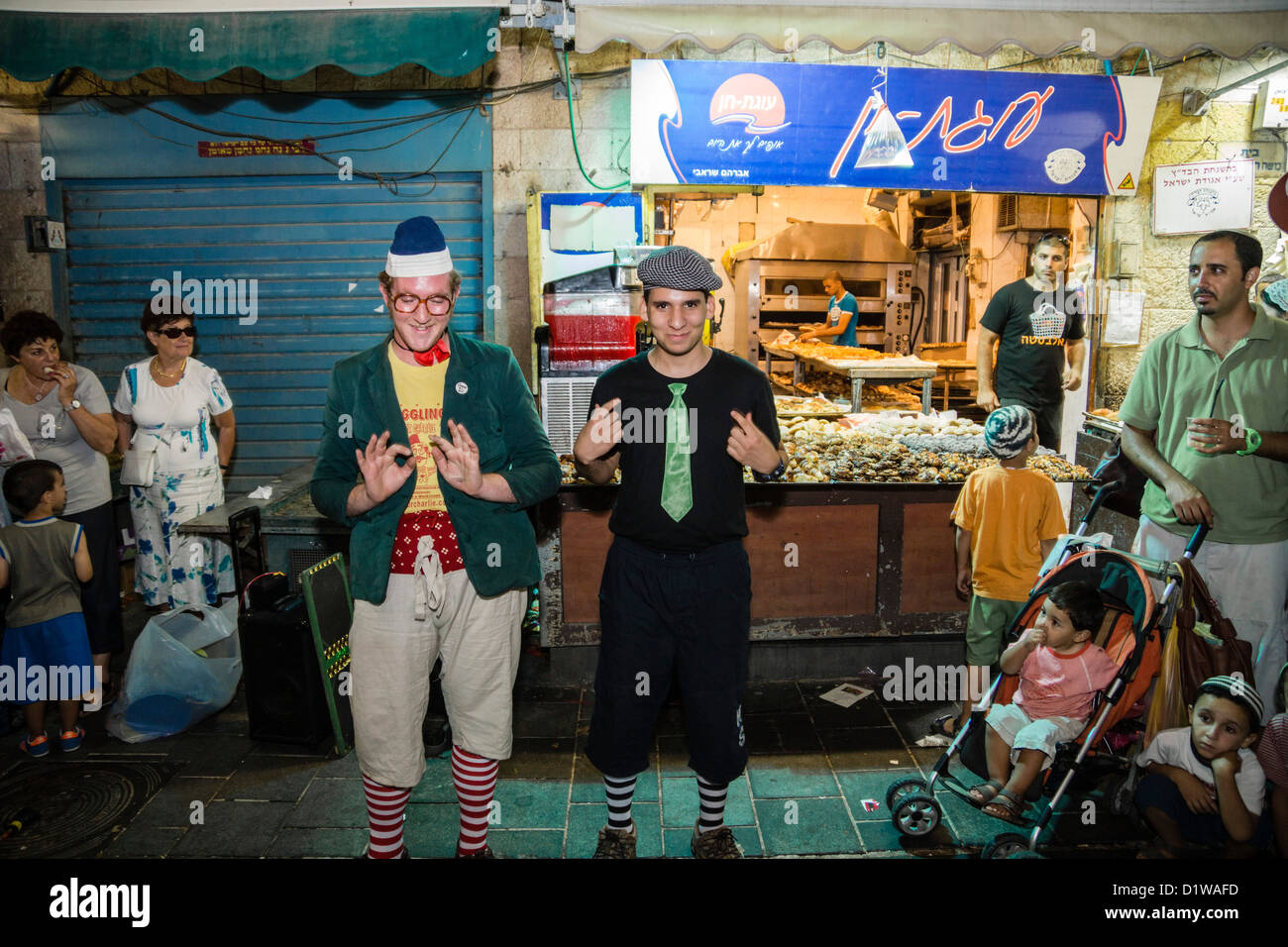 Jerusalem, Israel. Clowns performing in the "Mahane Yehuda" market ...