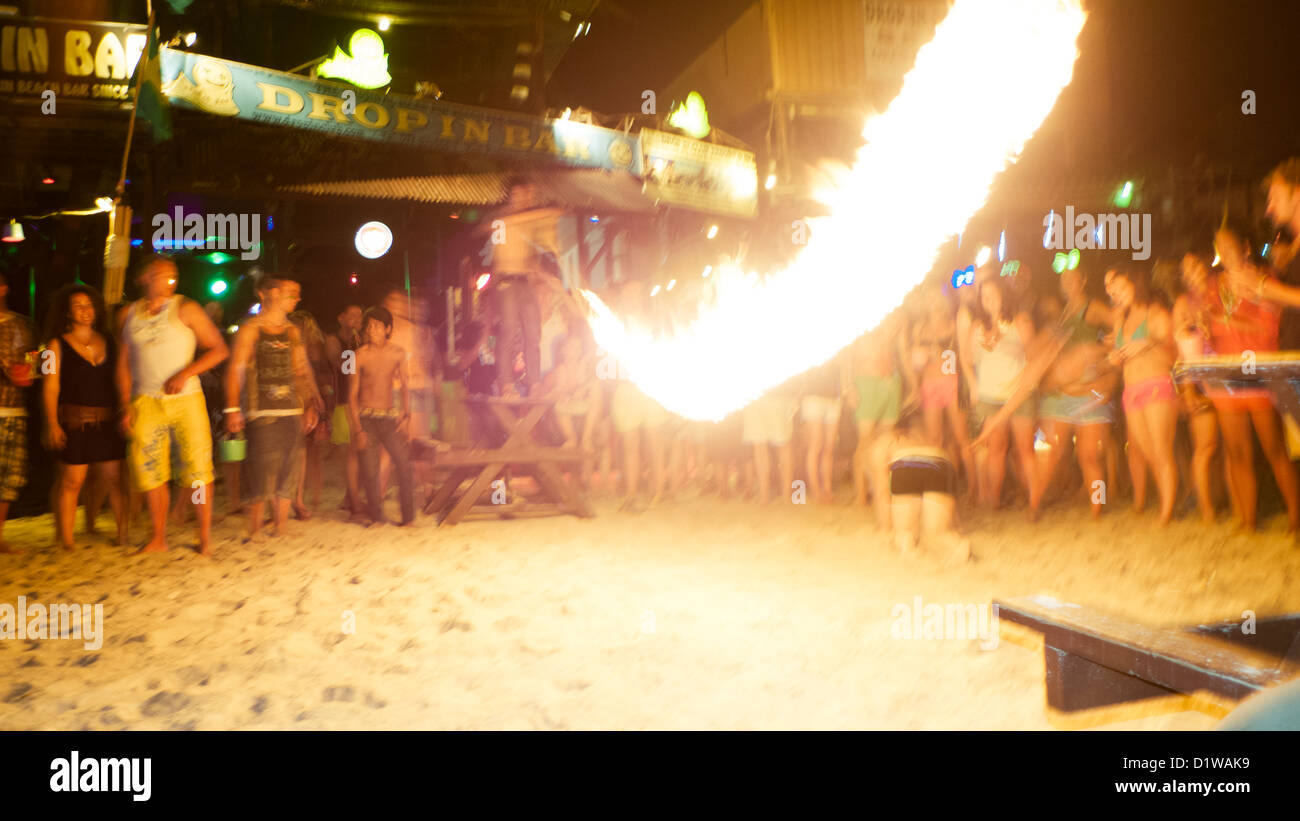 fully moon party in Koh Phangan of Thailand. Fire games played by all ...