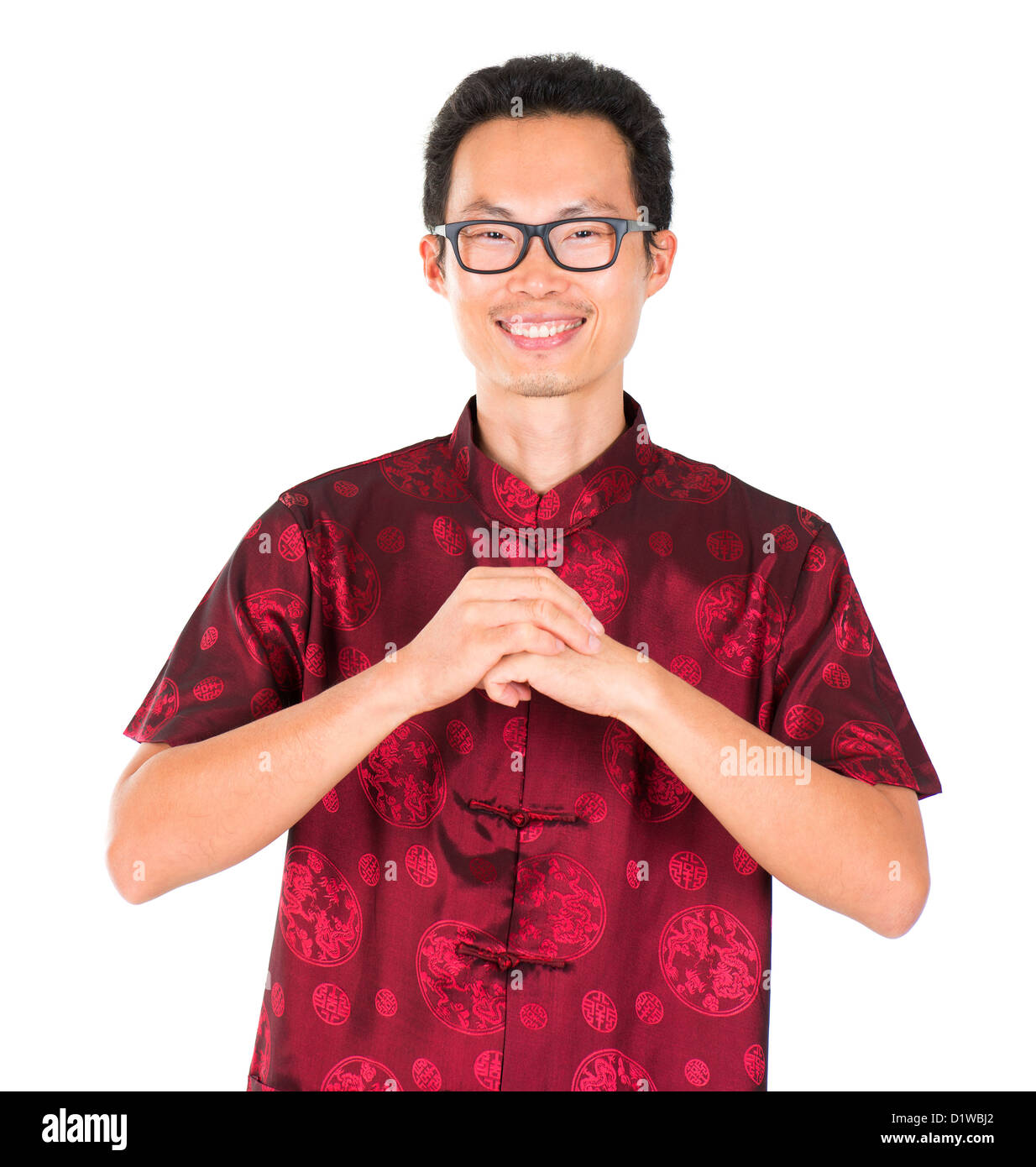 China man in traditional Chinese Tang suit greeting, isolated on white ...