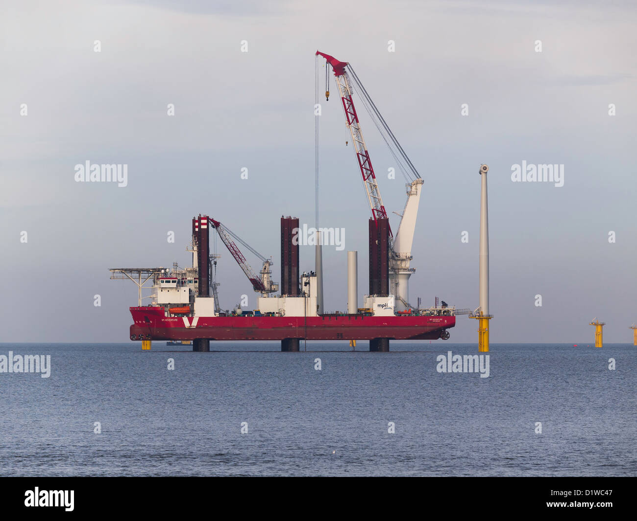 Jack Up heavy lift vessel MPI Adventure installing the wind turbine ...