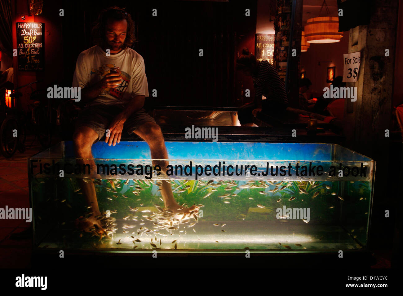 Fish Spa on Pub Street in Siem Reap Stock Photo - Alamy