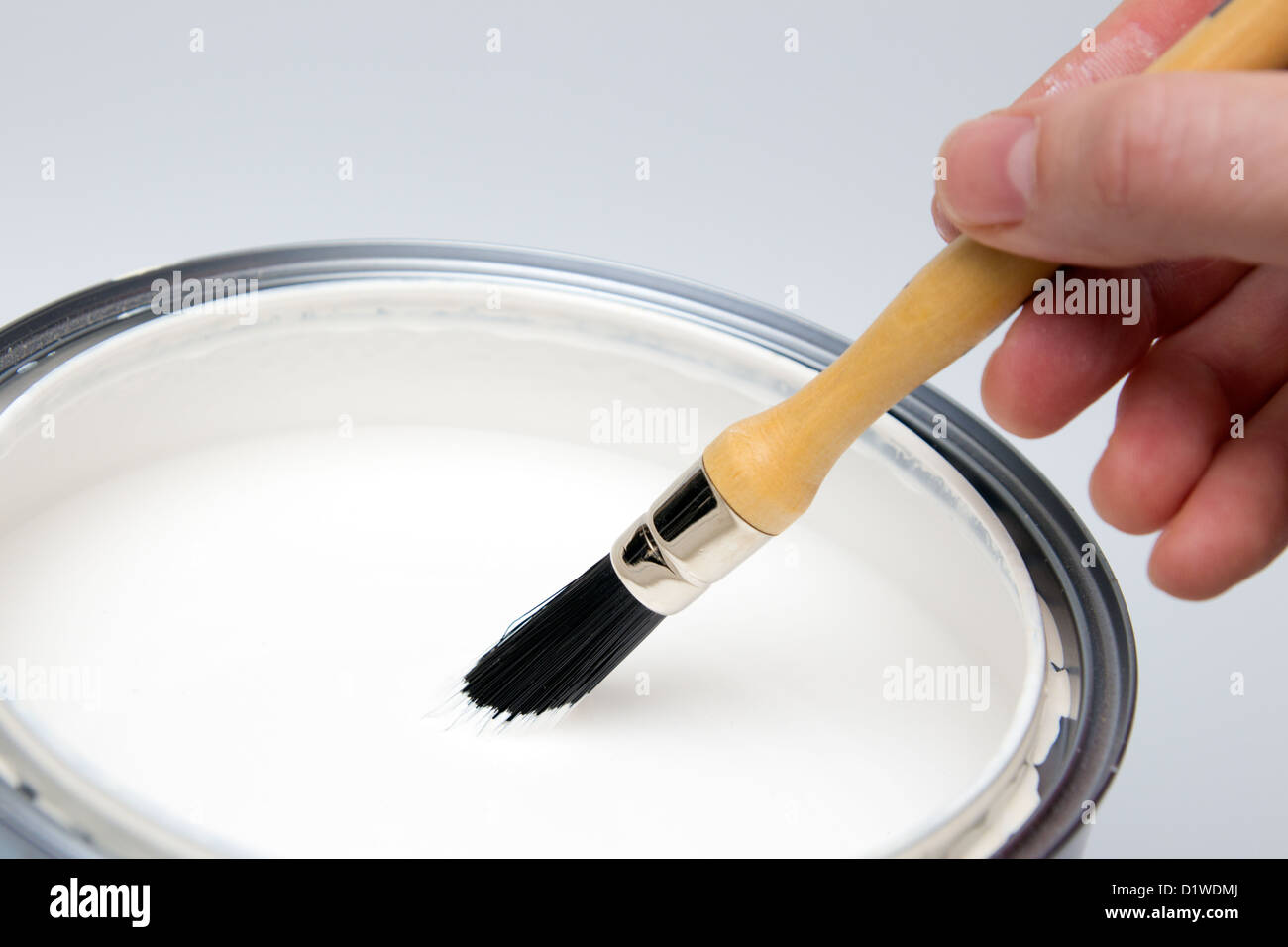 White paint with paintbrush Stock Photo - Alamy