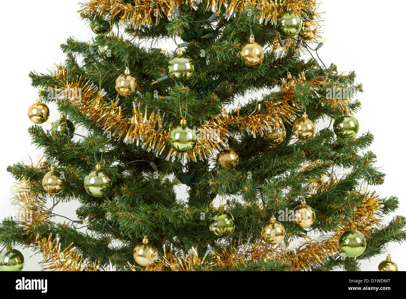 Decorated christmas tree with yellow and green balls on white ...