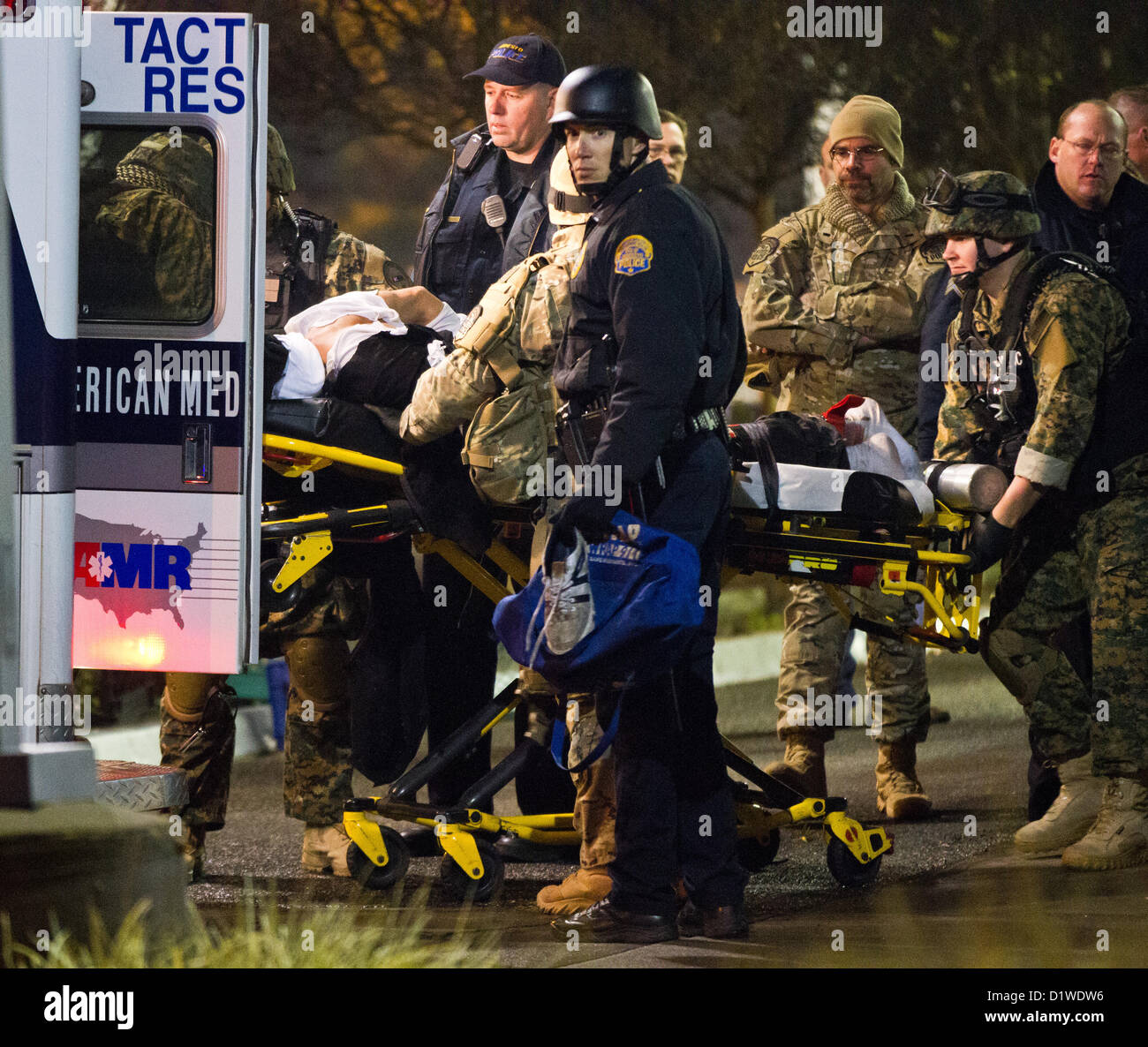 Jan. 6, 2013 - Modesto, CA, USA - A crazed man is loaded into an AMR ...