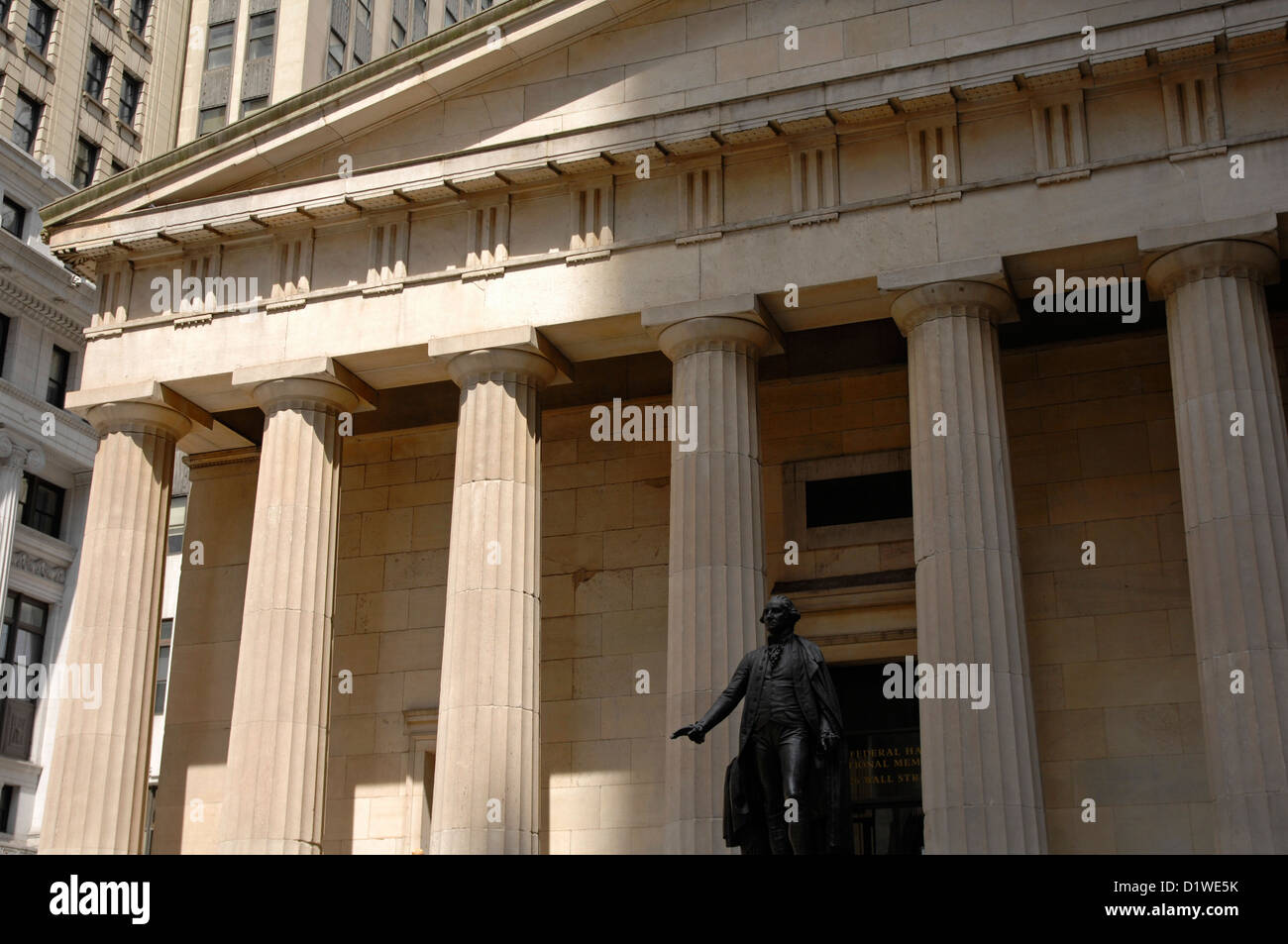 Federal Hall National Memorial facade and George Washington Statue ...