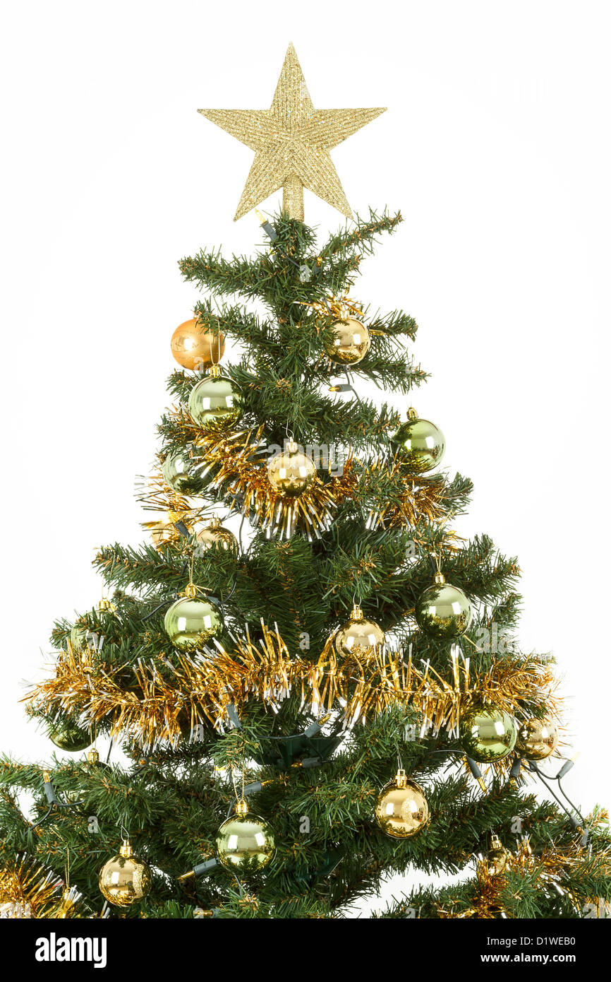 Decorated christmas tree with yellow and green balls on white ...