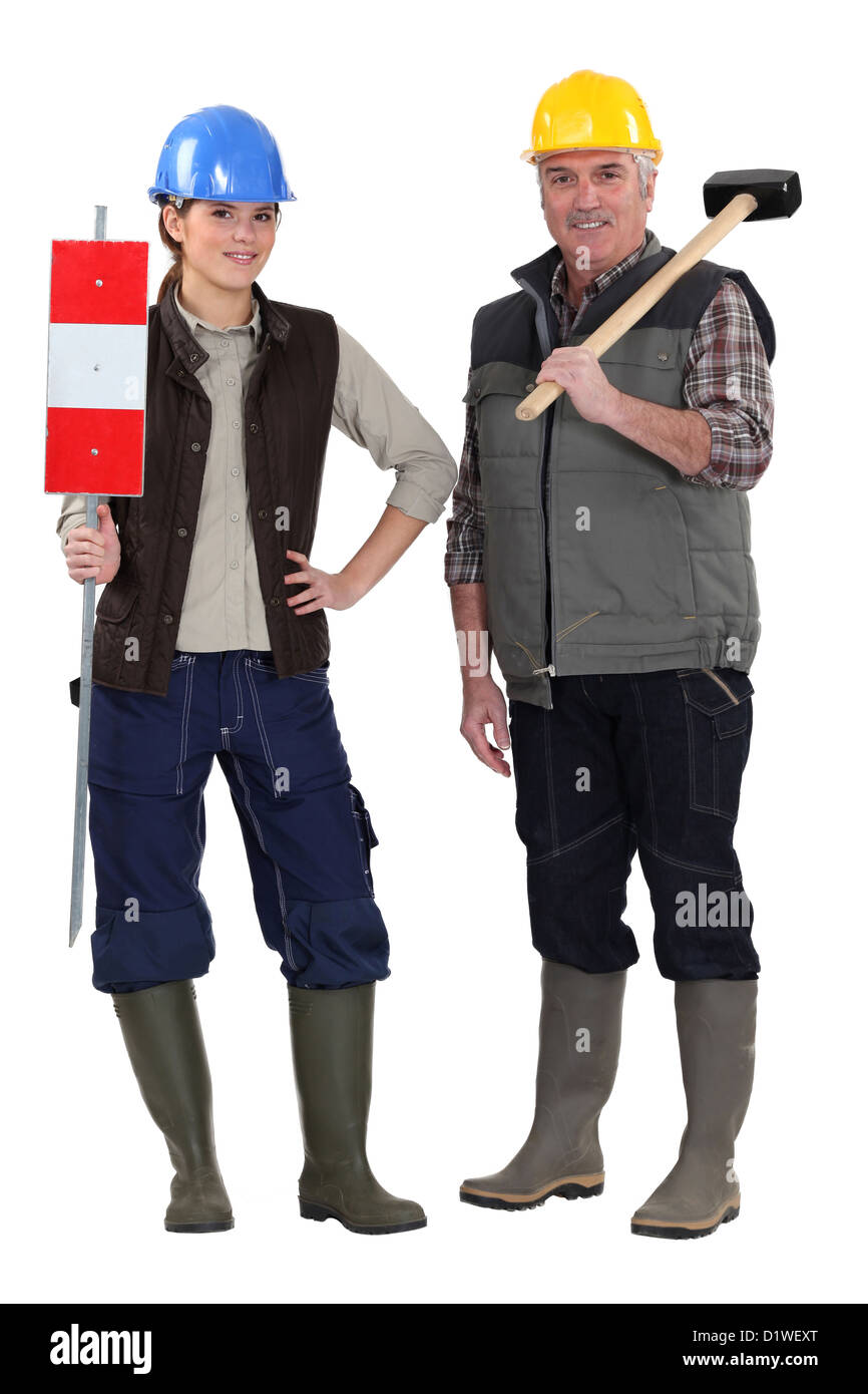 Laborer and female trainee Stock Photo - Alamy