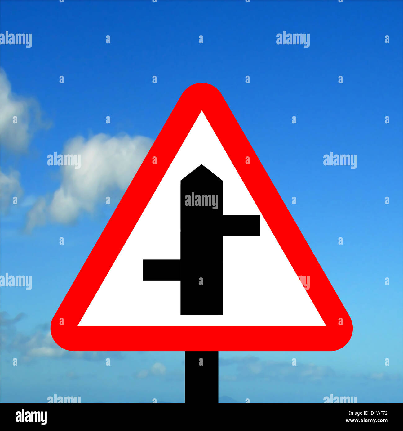 Staggered Junction road traffic sign Stock Photo - Alamy