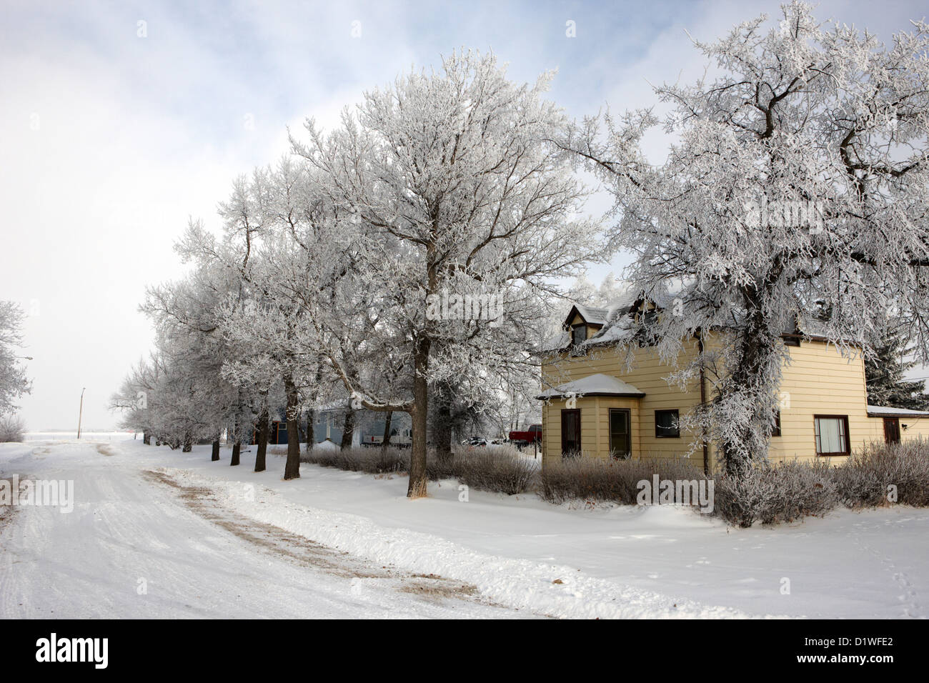 Street And Houses Covered In Snow And Ice High Resolution Stock ...