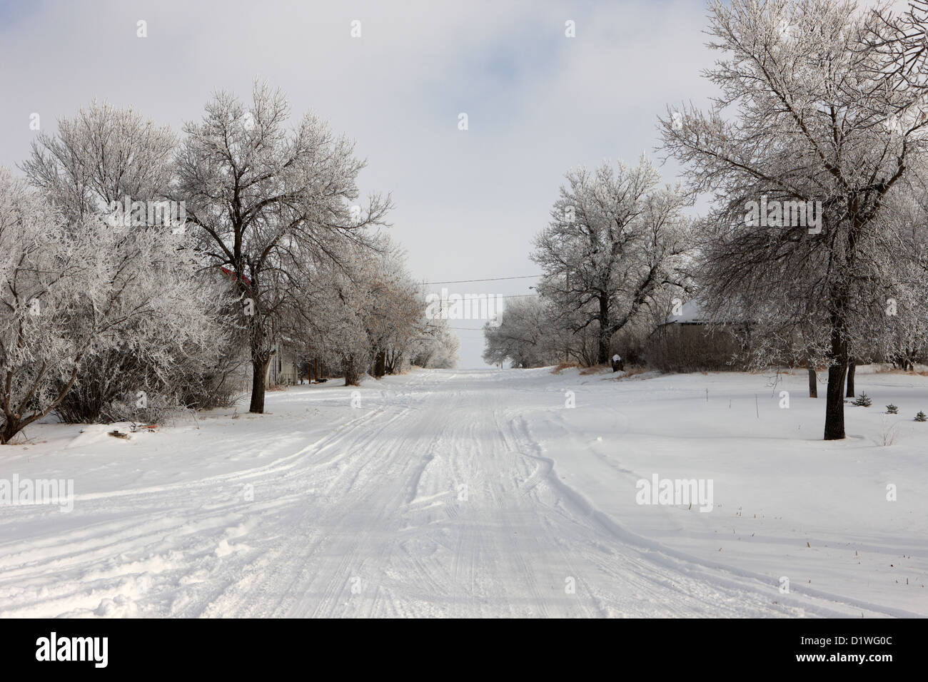 snow covered street in small rural farming community village Forget ...