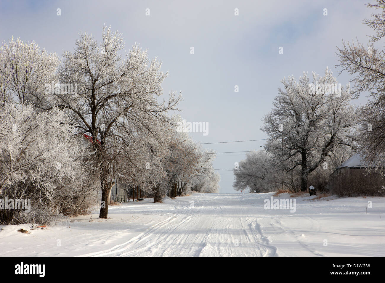 snow covered street in small rural farming community village Forget ...