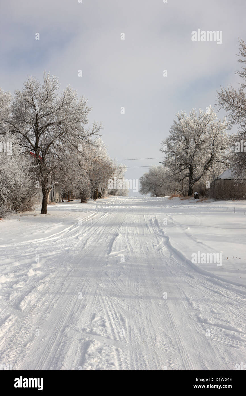 snow covered street in small rural farming community village Forget ...