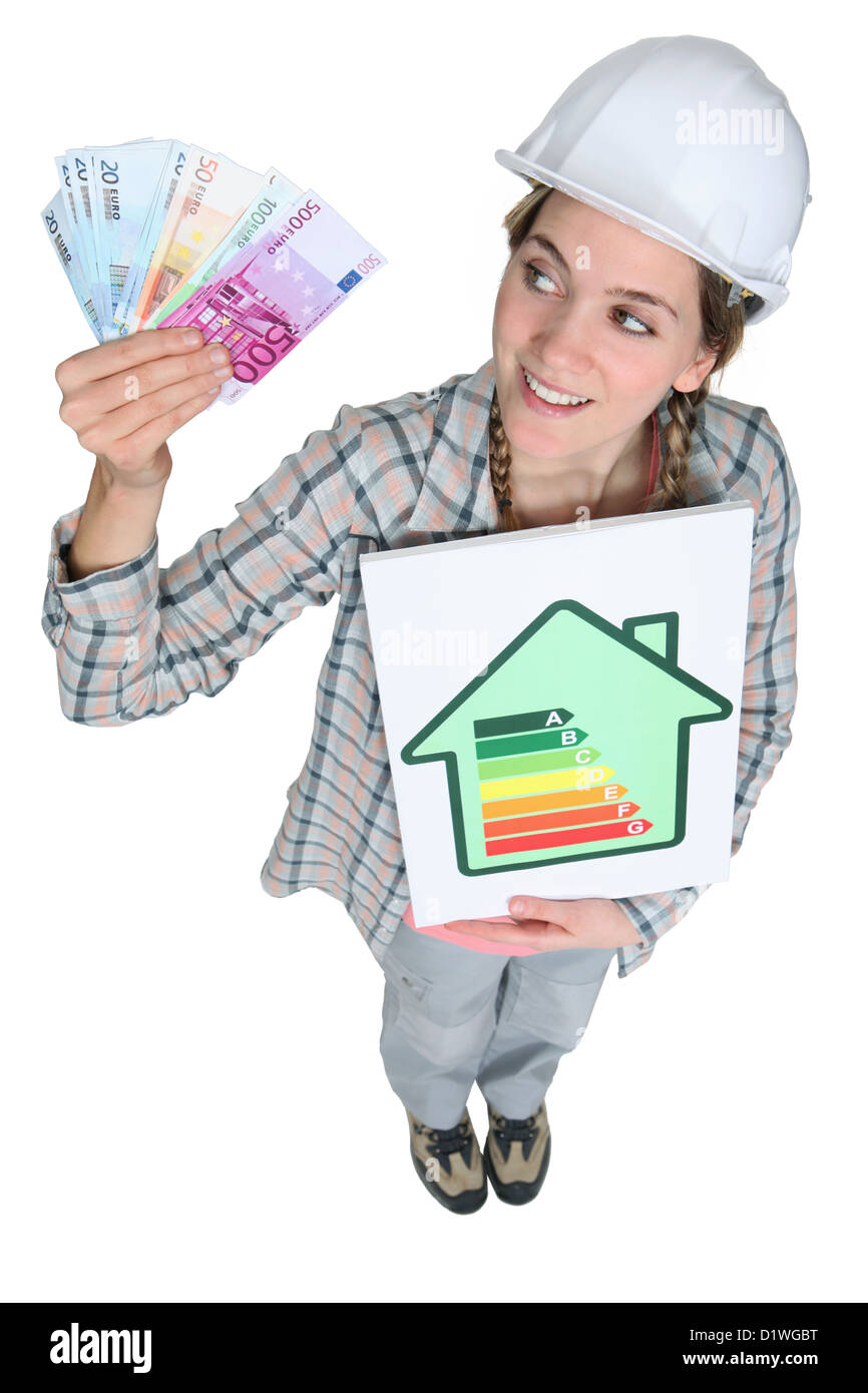 Cute female heating engineer Stock Photo - Alamy
