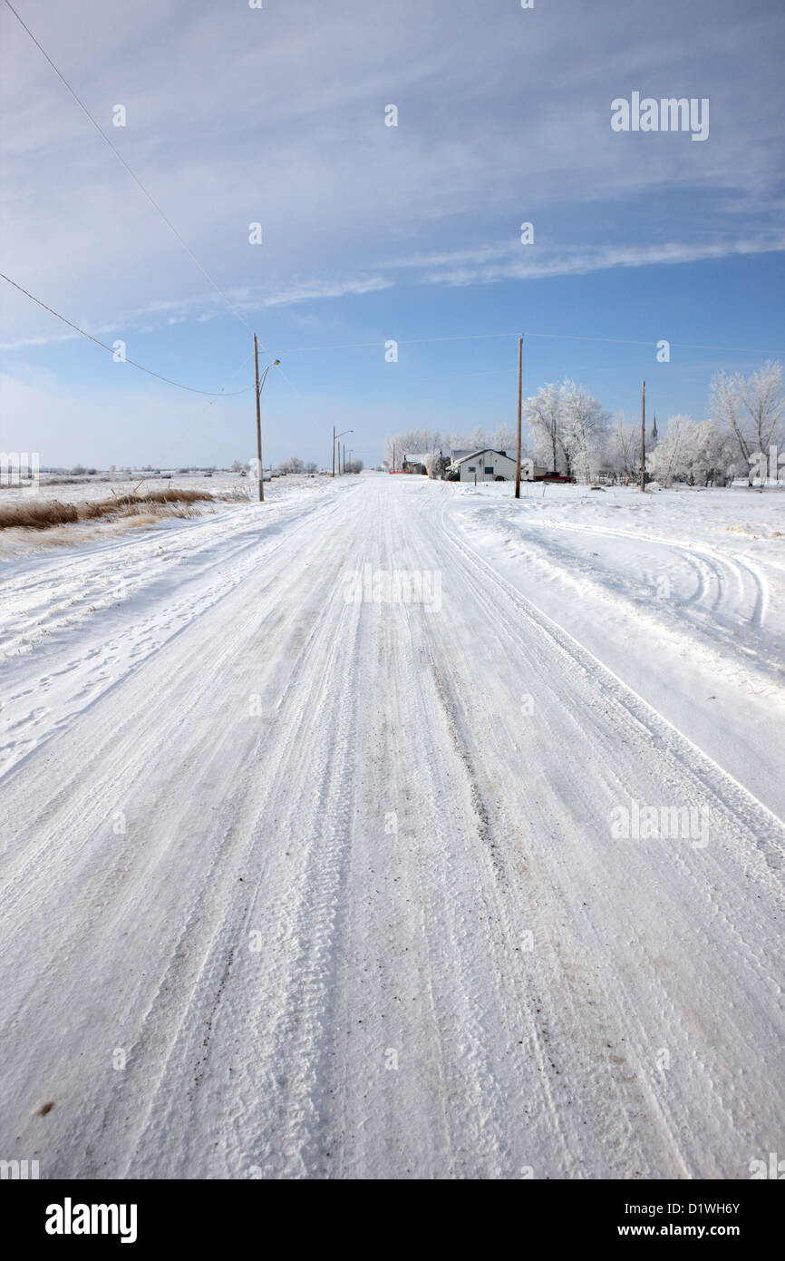 snow covered road in small rural farming community village Forget ...