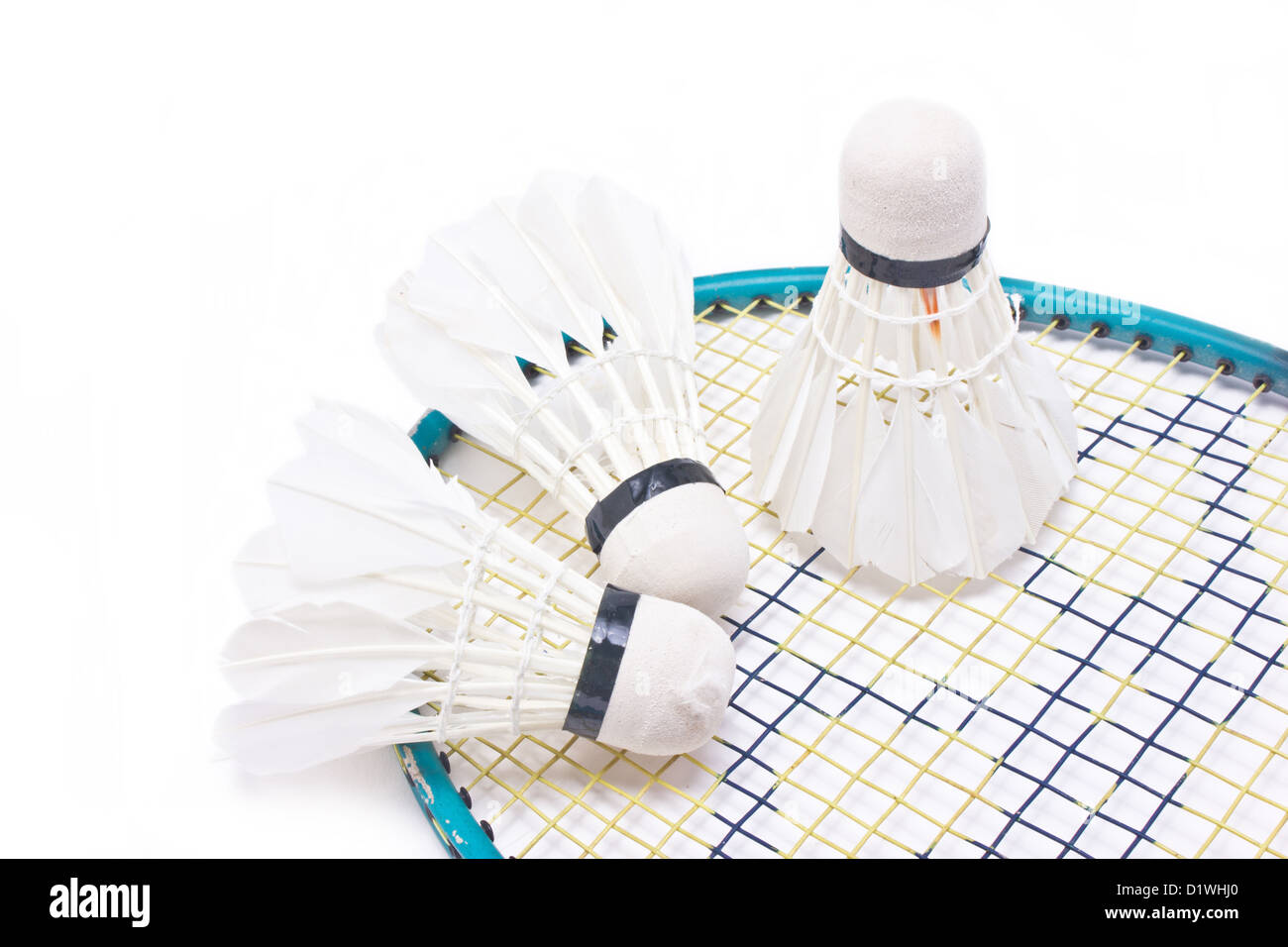 Shuttlecock with badminton racket isolated on white background Stock ...