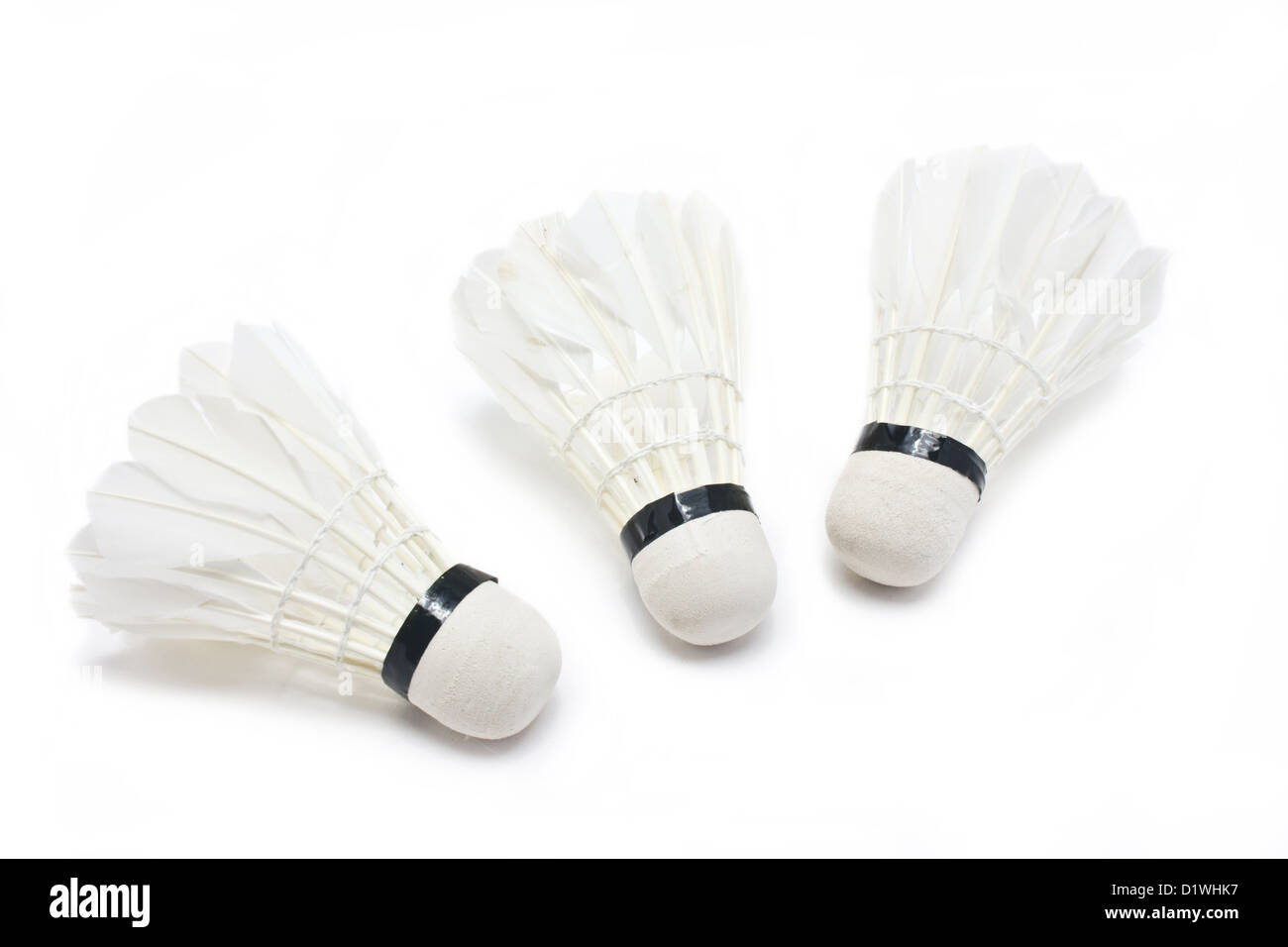 Three shuttlecocks isolated on white background Stock Photo - Alamy