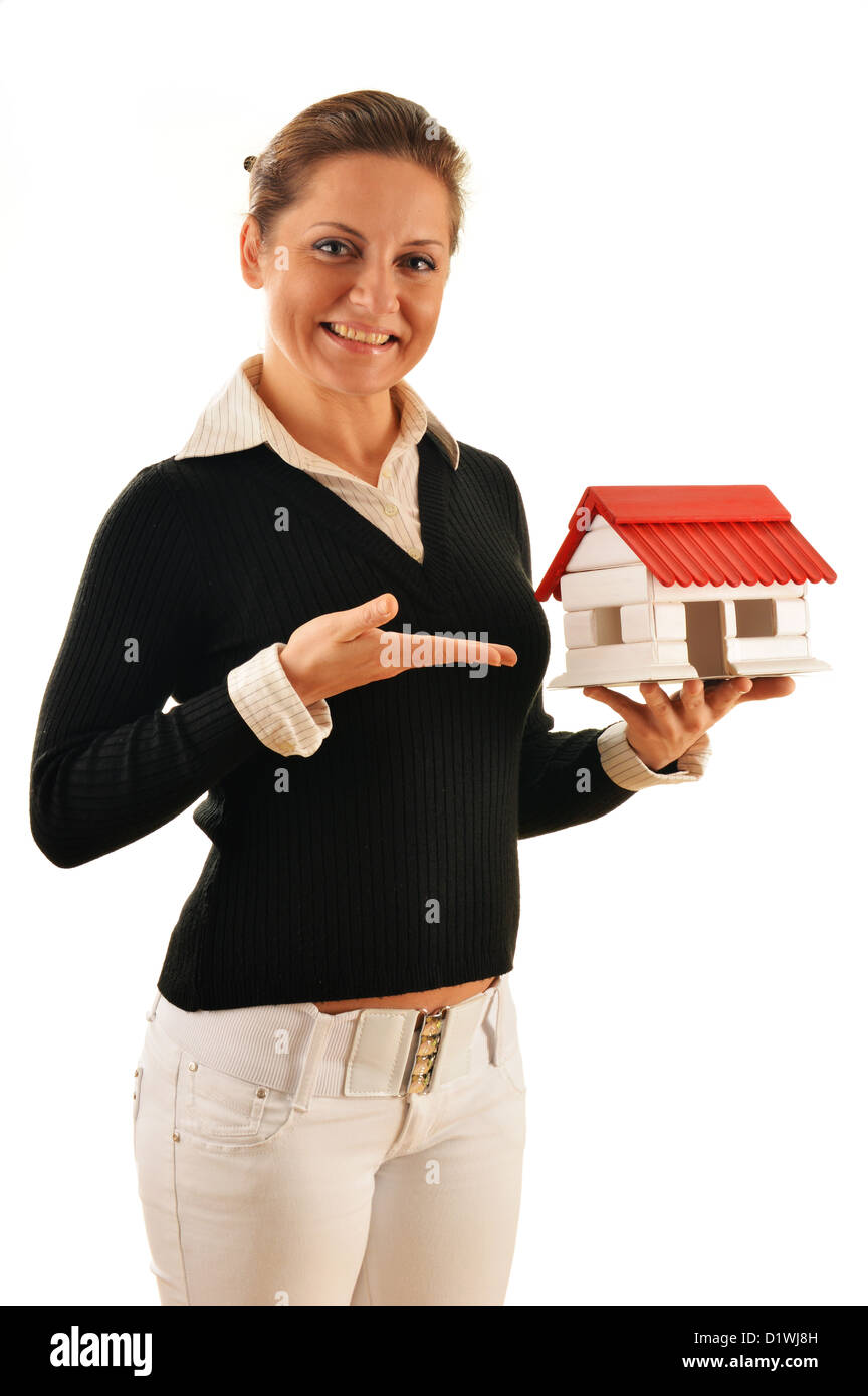 Real estate broker holding small house isolated on white Stock Photo ...