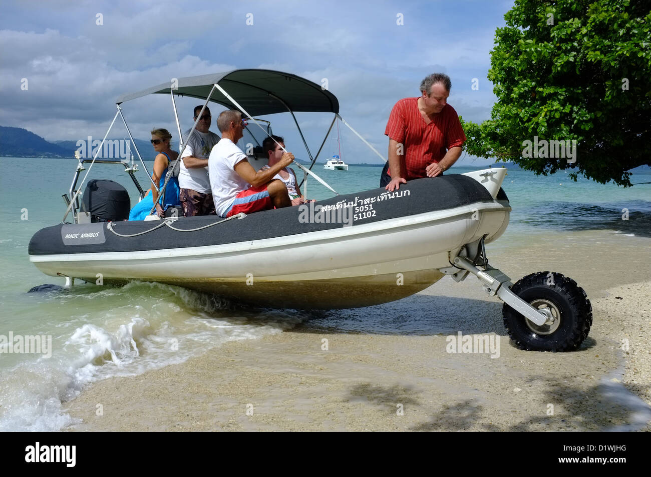 Sealegs an amphibious rigid inflatable boat drives up the beach on an ...