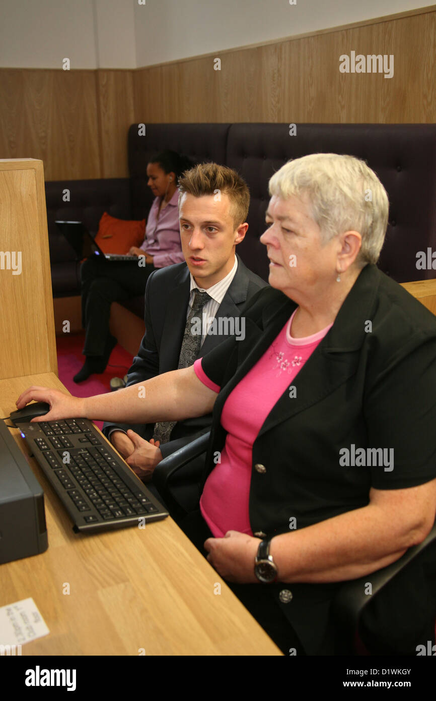 Senior citizen learning computer skills hi-res stock photography and ...