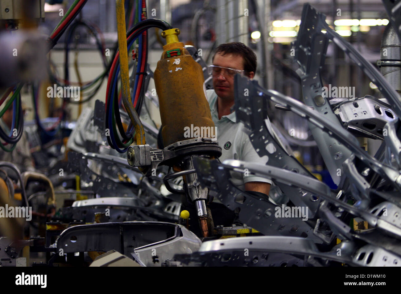 Car production line worker hi-res stock photography and images - Alamy