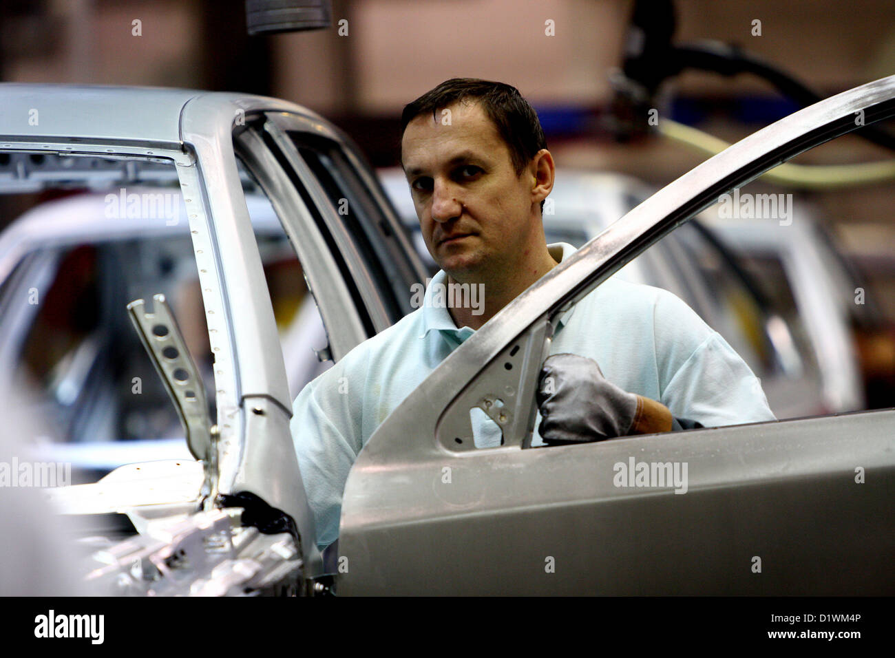 Assembly line workers cars hi-res stock photography and images - Alamy