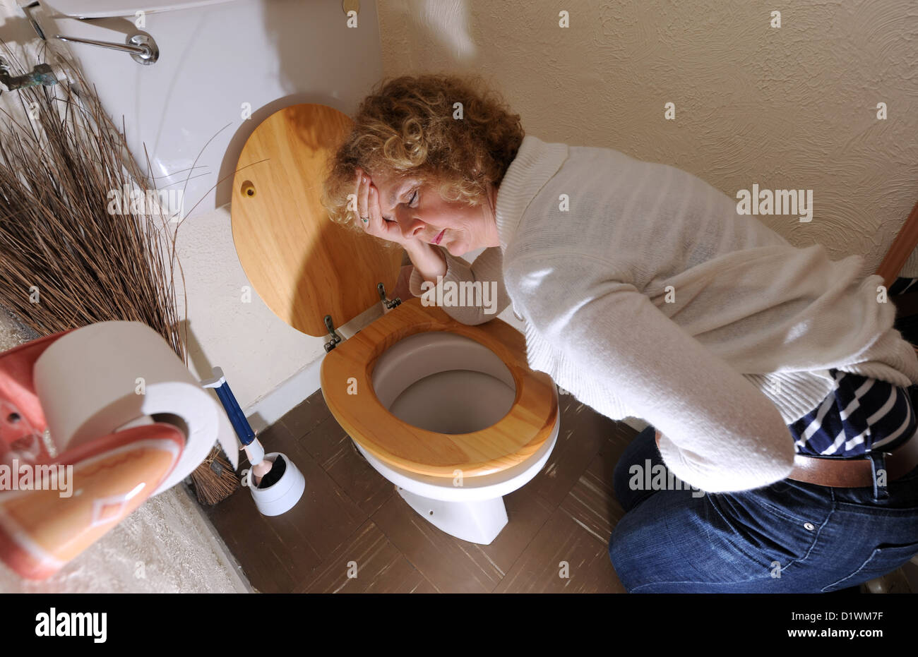Woman stomach sickness vomit toilet High Resolution Stock Photography ...