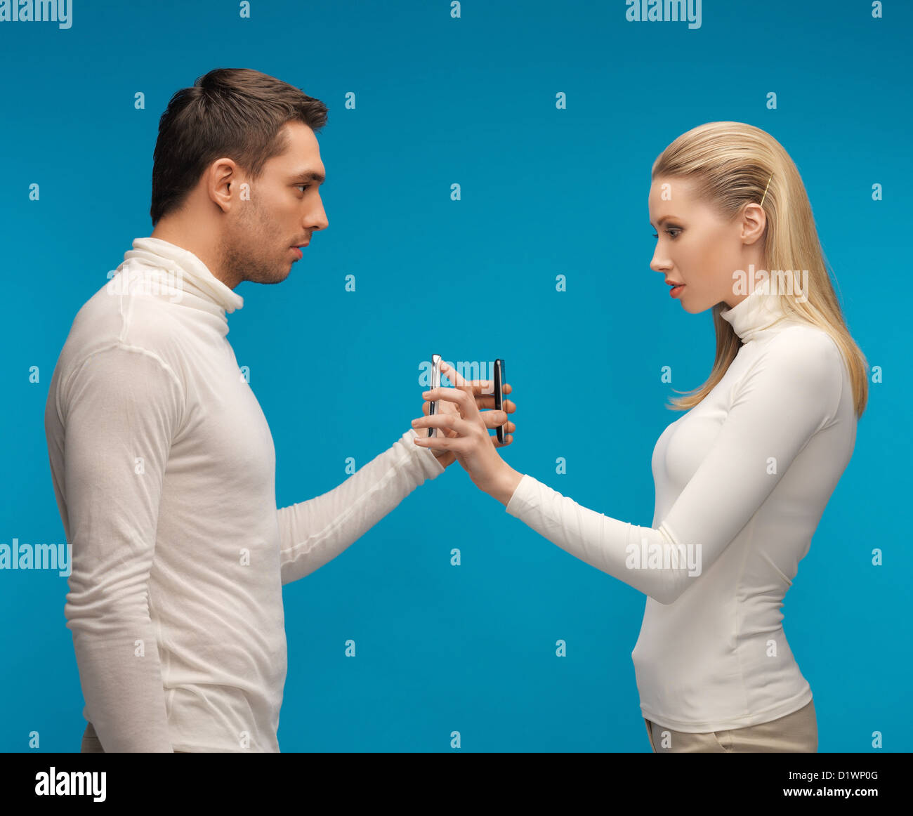 man and woman with modern gadgets Stock Photo - Alamy