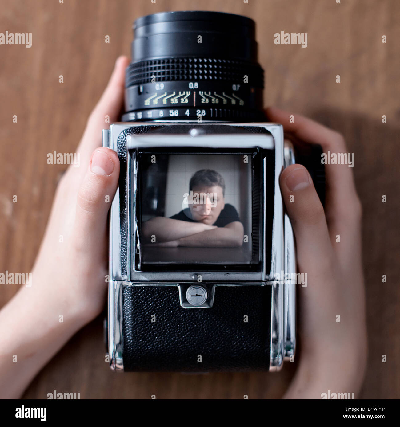 Man and the old camera Stock Photo - Alamy