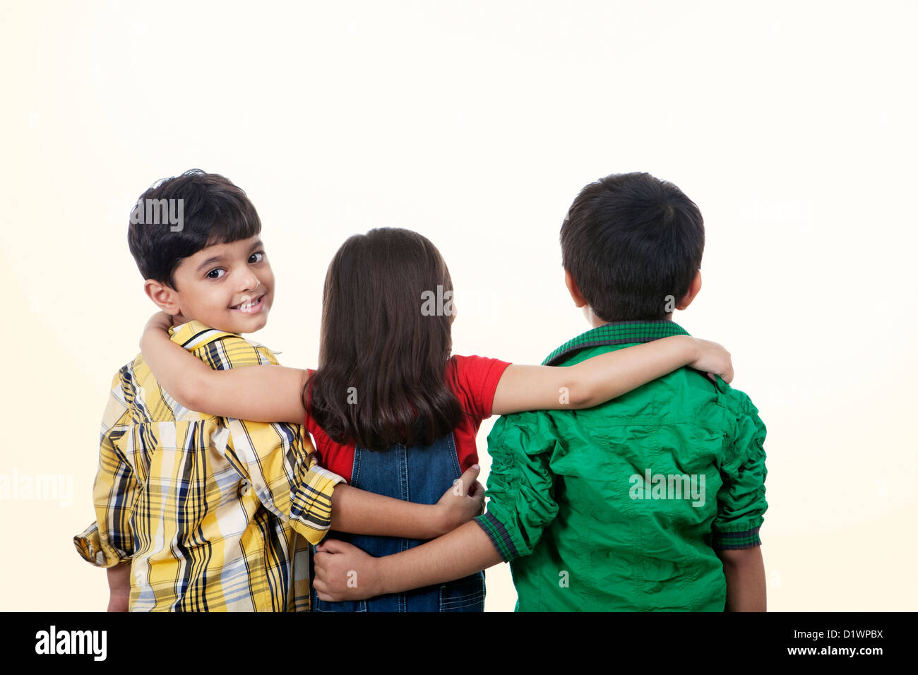 Children standing over white background Stock Photo - Alamy