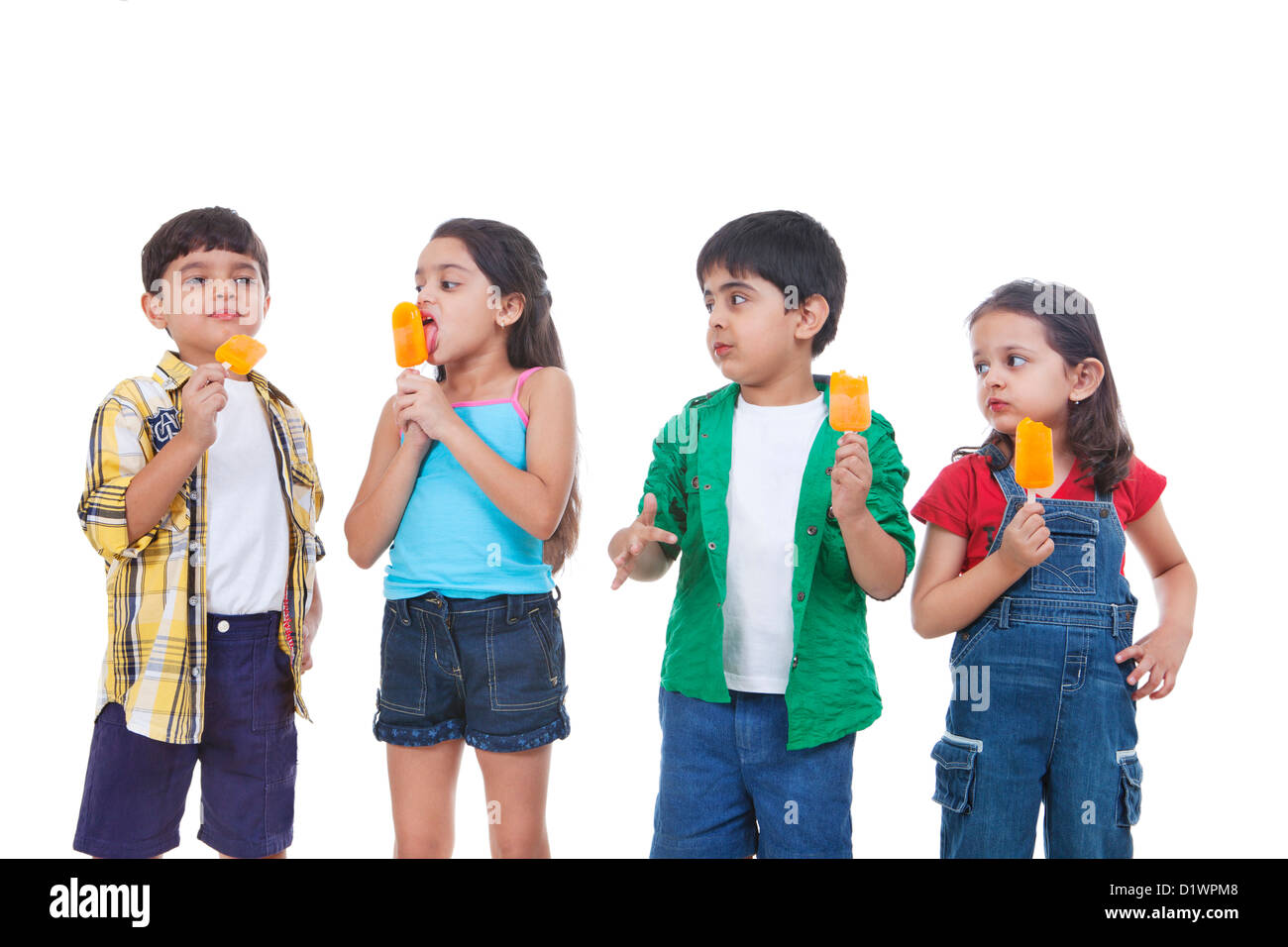 Children eating flavored ice Stock Photo - Alamy