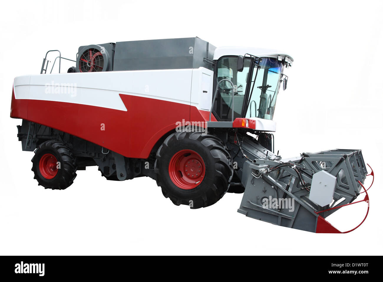 Red modern combine separately on a white background Stock Photo - Alamy