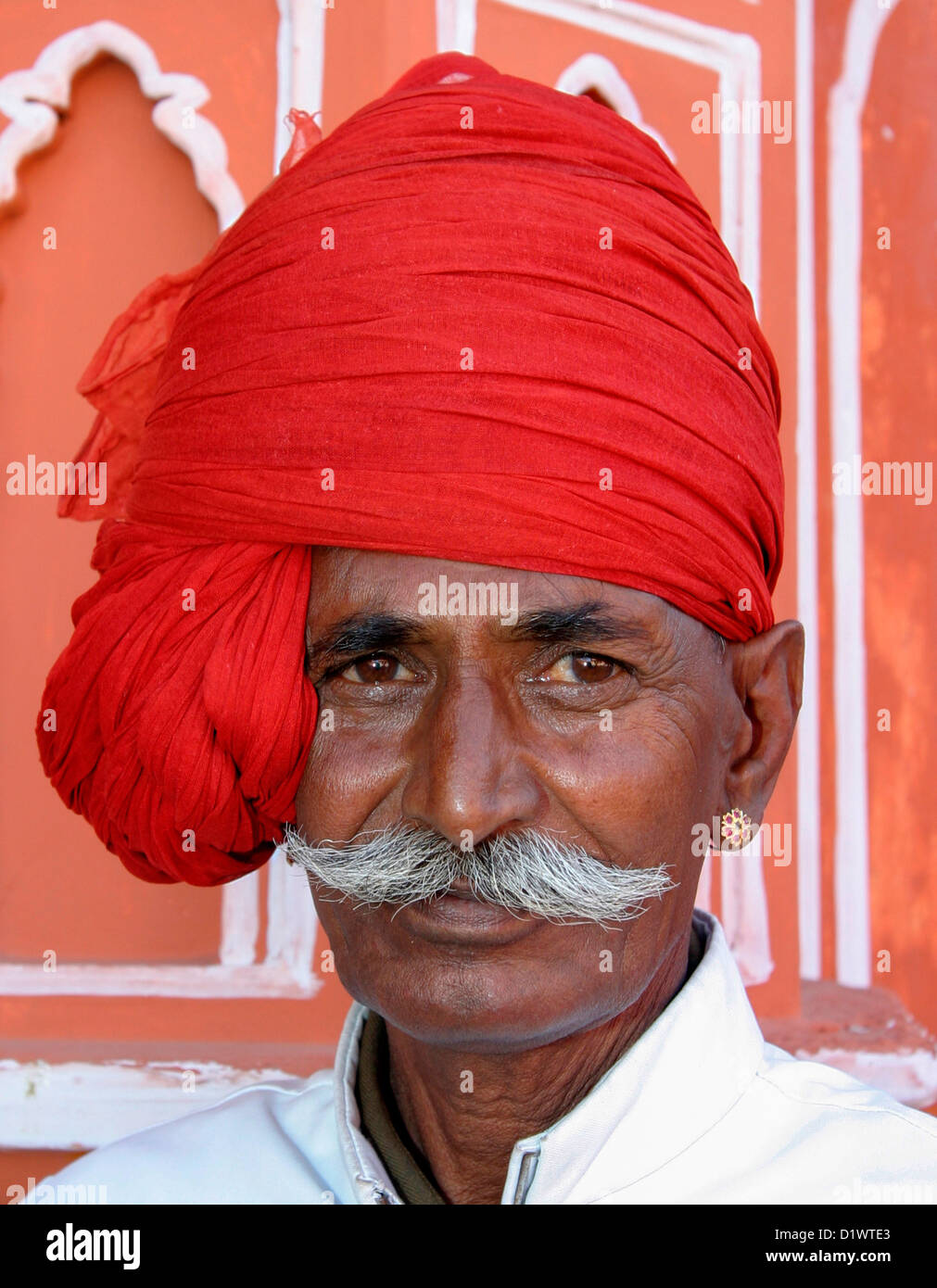 Portrait of a museum guard with a magnificent moustache and colourful ...